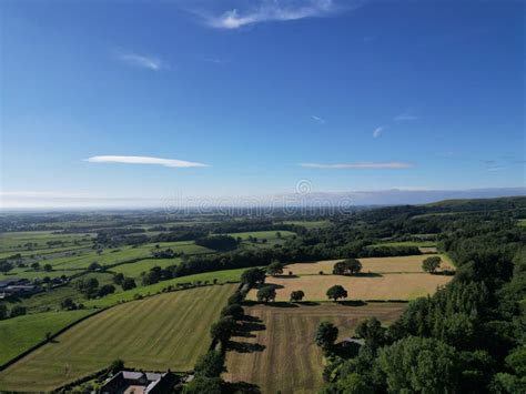 Aerial Shot Of Farm Fields On A Sunny Day Stock Illustration