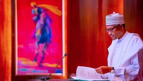 Pictures From President Muhammadu Buhari Signs The Electoral Act