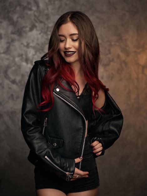 Premium Photo Beautiful Redhead Woman Standing Against Wall