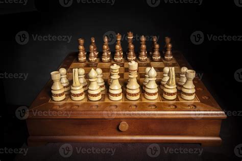 Chess Pieces Of Wood On A Beautiful Chessboard A Puzzle Game With