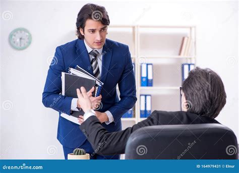 Boss And His Male Assistant Working In The Office Stock Image Image