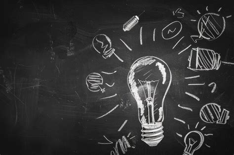Creative Light Bulb Sketch On Chalkboard Concept For Ideas And