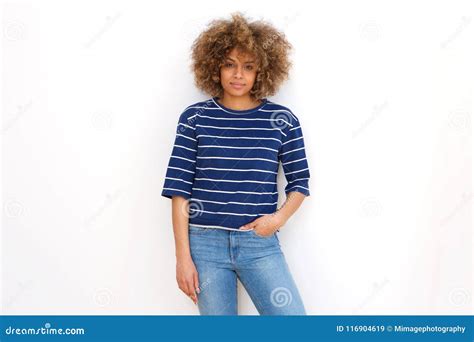 Cool Young African American Woman With Curly Hair Standing Against