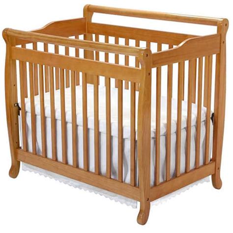 Davinci Emily Mini Crib In Oak Bed Bath And Beyond 4333524