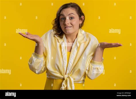 No Idea I Dont Know Answer Puzzled Clueless Uncertain Attractive Woman Raising Hands In