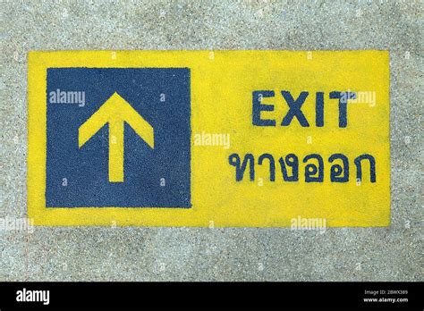 Close Up Exit Sign On The Ground Stock Photo Alamy