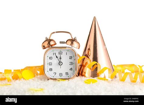 Christmas Composition With Alarm Clock Party Hat And Serpentine On