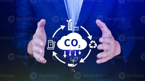 Hand Holding Co2 Reducing Virtual Icon For Decrease Carbon Dioxide