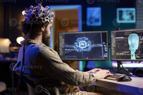 Developer With Eeg Headset On Programming Brain Transfer Into Computer