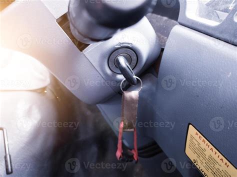 Key Inserted Into The Lock Of Ignition Switch Of The Vehicle Truck