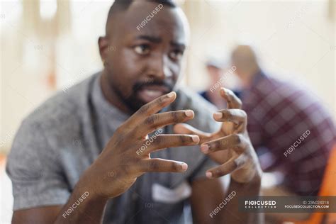 Man Talking Gesturing With Hands Challenge Incidental People
