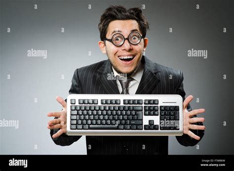 Comouter Geek With Computer Keyboard Stock Photo Alamy
