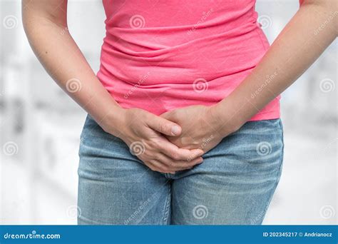 Woman With Hands Holding Her Crotch She Wants To Pee Stock Image