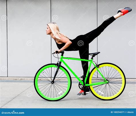 Fitness Princess With Long Hair Girl In Black Outfit And Sneakers Show