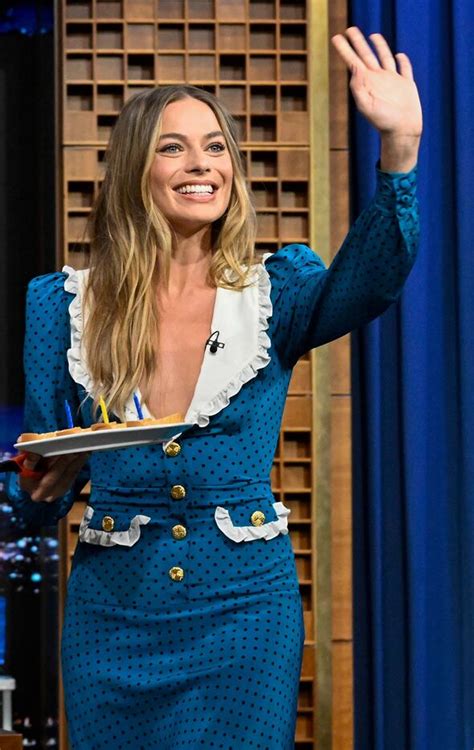 Margot Robbie Goes Braless As Actress Dons Plunging Retro Dress For New