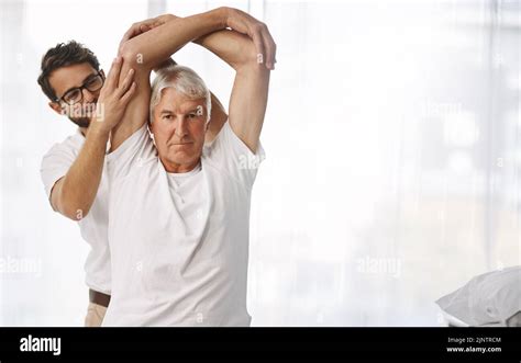 Your Mobility Seems Good A Young Male Physiotherapist Working With A