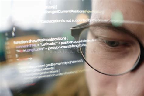 Eye Of Male It Programmer Wearing Glasses Looking At Computer Screen