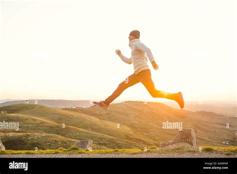 Man In Outdoor Running And Jumping Stock Photo Alamy
