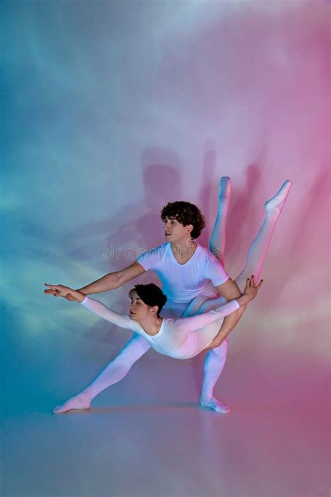 Ballet Duo Performing Acrobatic Figure Male Supporting Female In