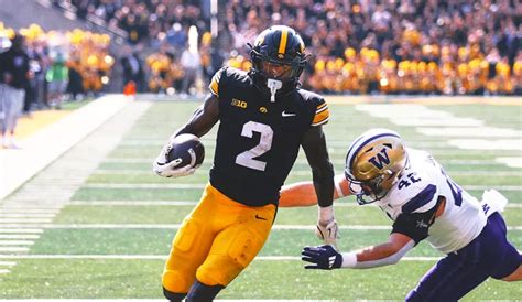 Kaleb Johnsons Three Touchdowns Lifts Iowa Over Washington 40 16
