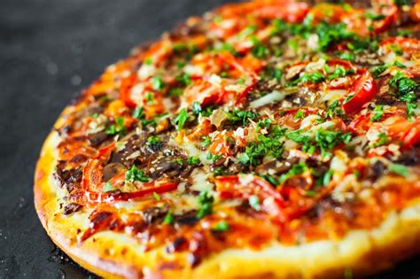 Pizza With Mozzarella Cheese Mushrooms Tomatoes Pepper Spices And
