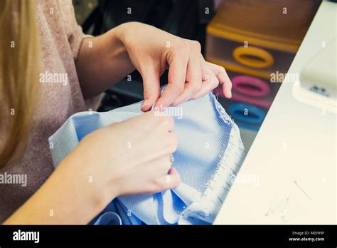 Female Hands Sewing With Needle And Thread Seamstress Occupation