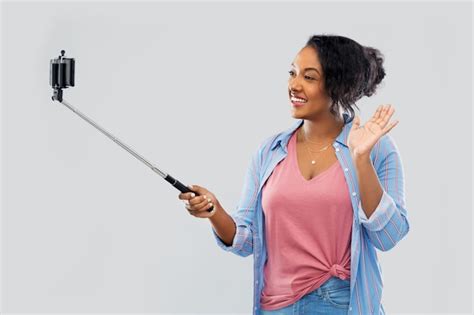 Premium Photo African American Woman Taking Selfie By Smartphone