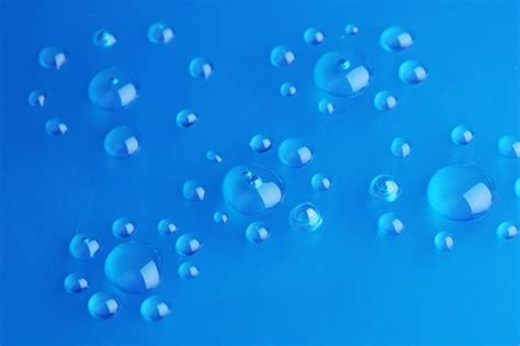 Premium Photo Water Drops On Blue Background