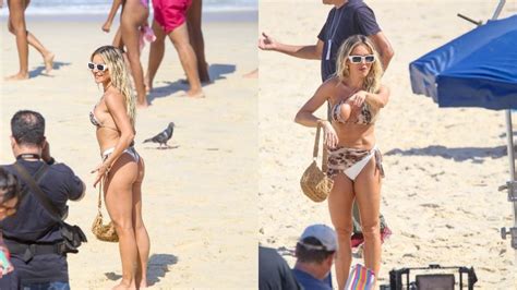 Monique Alfradique grava de biquíni Rainer Cadete em praia no Rio