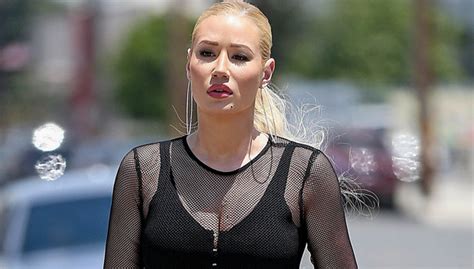 Iggy Azalea Puts Her Curves On Display In Revealing Mesh Dress Pics