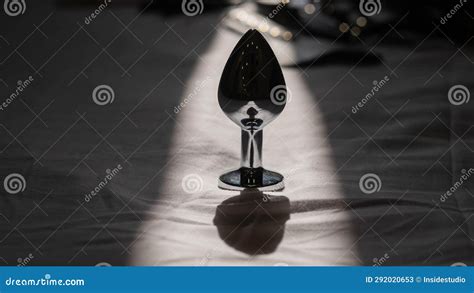 Steel Anal Plug On A White Sheet Stock Image Image Of Fantasy