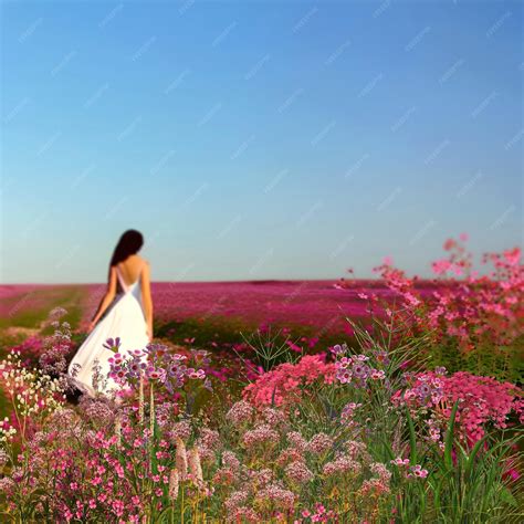 Premium Photo Young Woman In White Dress Sun Flares Summer Wild Field