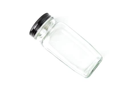 Premium Photo Empty Glass Jar Over White Background