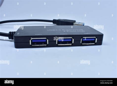 Closeup Of A Black Portable USB Hub With A Wire Isolated On White Background Stock Photo Alamy