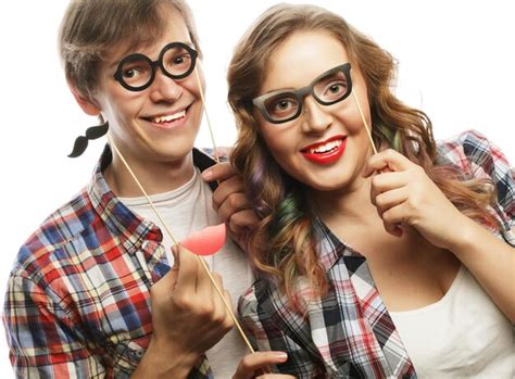 Premium Photo Lovely Couple Holding Party Glasses
