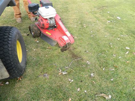 LGCC Golf Maintenance Grinding Tree Roots