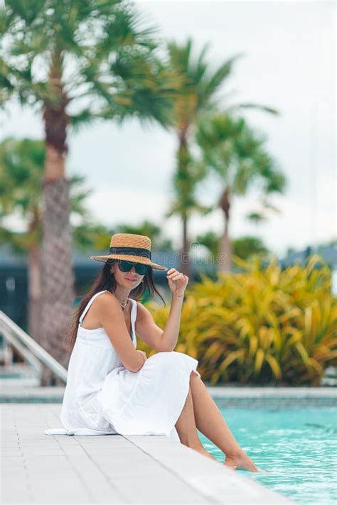 Young Beautiful Woman Enjoying Summer Vacation In Infinity Luxury