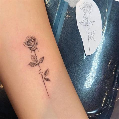 Micro Realistic Rose Tattoo On The Inner Arm