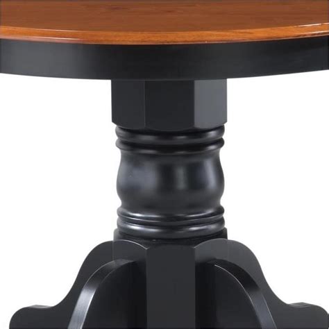 Bowery Hill Round Pedestal Dining Table In Black And Cottage Oak