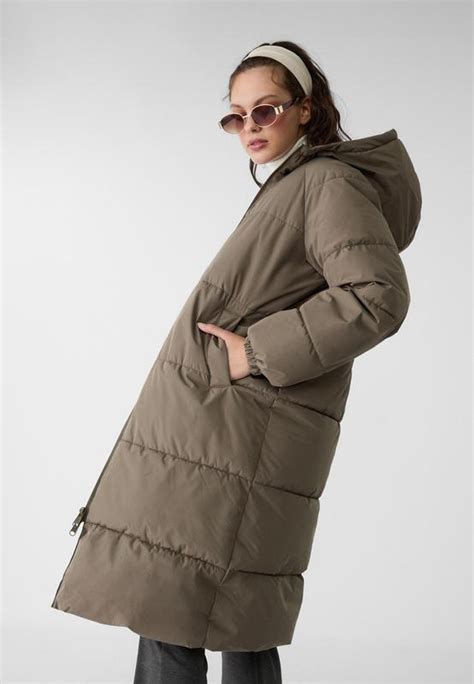 Stradivarius довга стьобана куртка — ціна 499 грн у каталозі Куртки Купити жіночі речі за