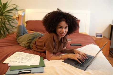 Premium Photo Ui Designer Working In Bedroom