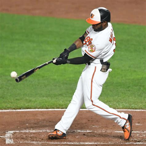 Download Cedric Mullins In Action On The Baseball Field Wallpaper