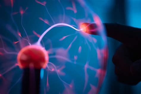 Premium Photo Plasma Ball Hands Holding Plasma Light Ball Plasma Ball