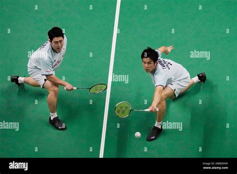 Japan S Yugo Kobayashi Right With Takuro Hoki Returns The Shot To Taiwan S Wang Chi Lin And