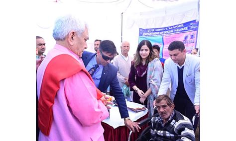 Lg Manoj Sinha Meeting A Civilian During Viksit Bharat Sankalp Yatra At