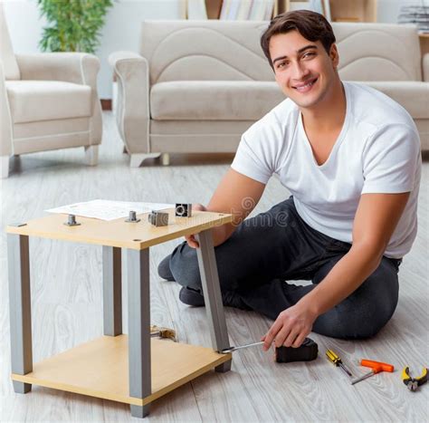 Man Assembling Furniture At Home Stock Image Image Of Fasten Equipment 281347493