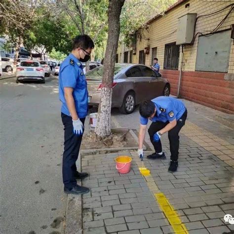 宣化城管整治背街小巷，改善市容市貌环境