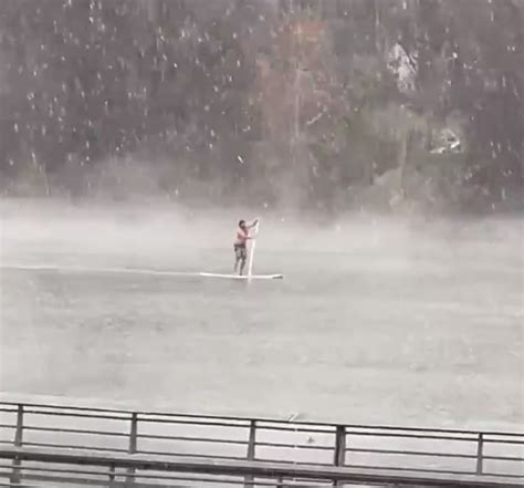 Watch Austin Man Paddleboards Shirtless On Lady Bird Lake While It Snows