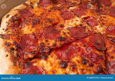 Pepperoni Pizza With Pickled Hot Jalapeno Peppers In Cardboard Delivery