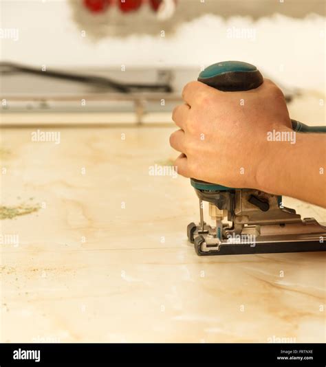 Installing New Induction Hob In Modern Kitchen Stock Photo Alamy